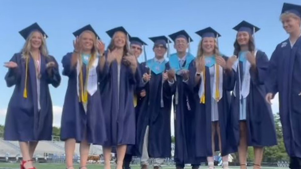 Here's the story behind a viral high school graduation video that shows ...