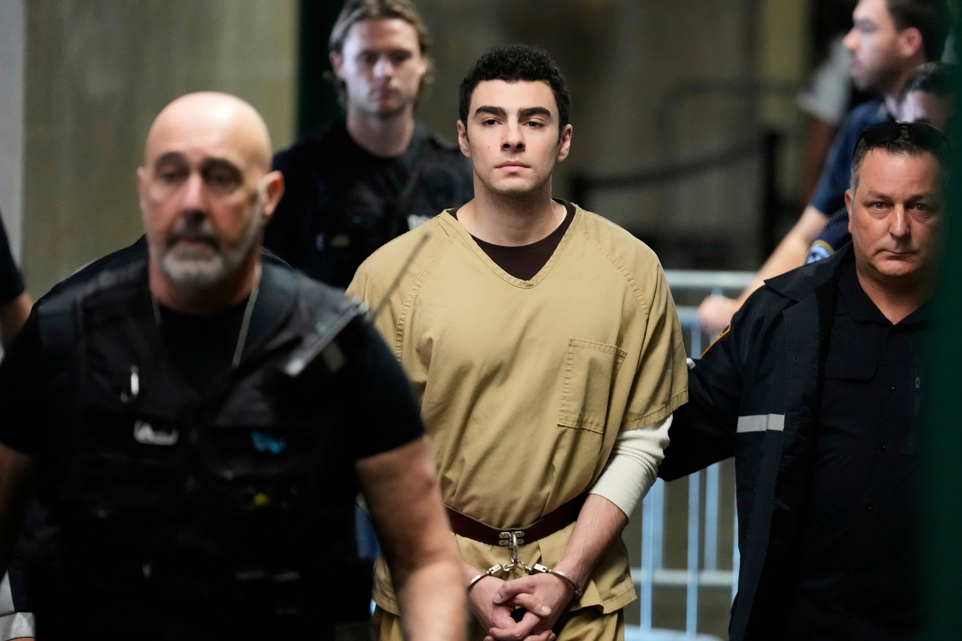 Luigi Mangione hearing: Judge tosses 2 murder charges as act of ...