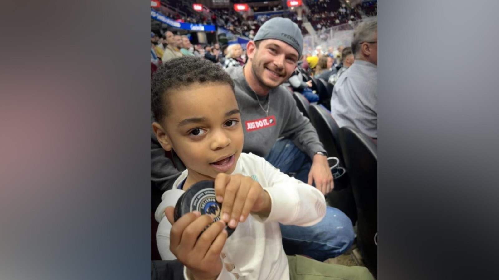 Hero hockey fan blocks out-of-play puck from hitting 4-year-old boy ...