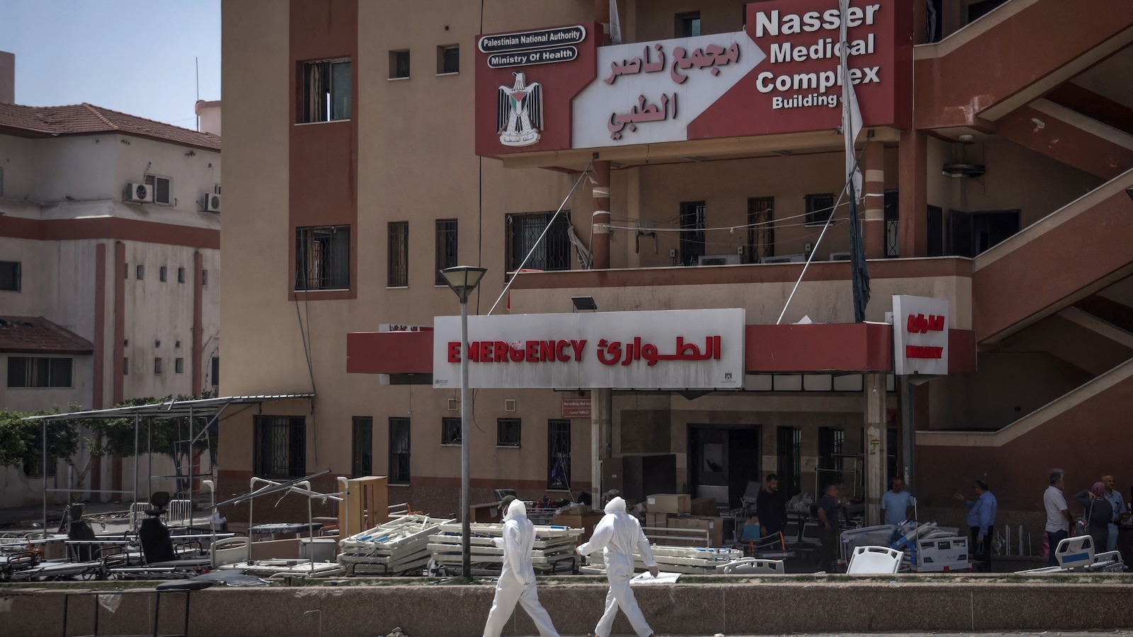 Searching for the dead as mass graves exhumed in Gaza: 'We are all ...