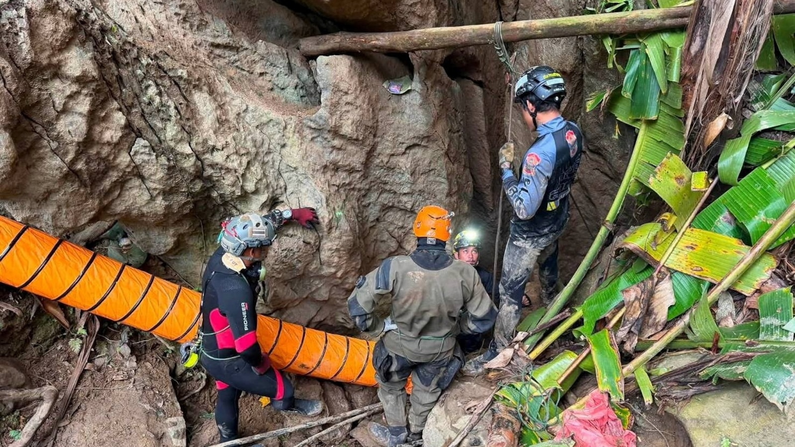 Laos cave operation locates 5 people, search group says, with 2 still ...