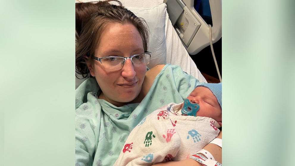 Woman shocked to welcome baby after experiencing stomach pain on ...