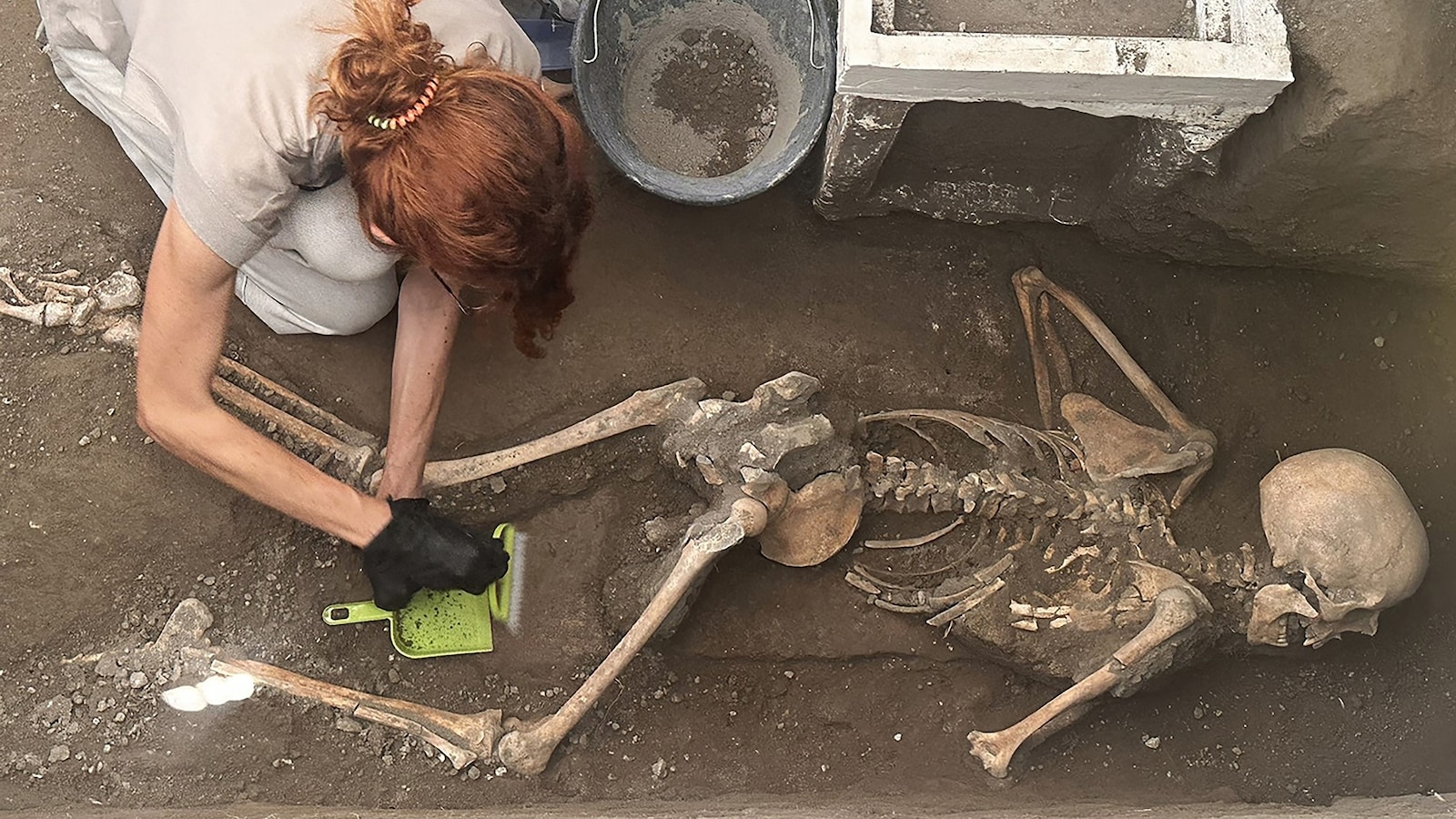 Pompeii archaeologists discover remains of 2 bodies with 'cache of ...