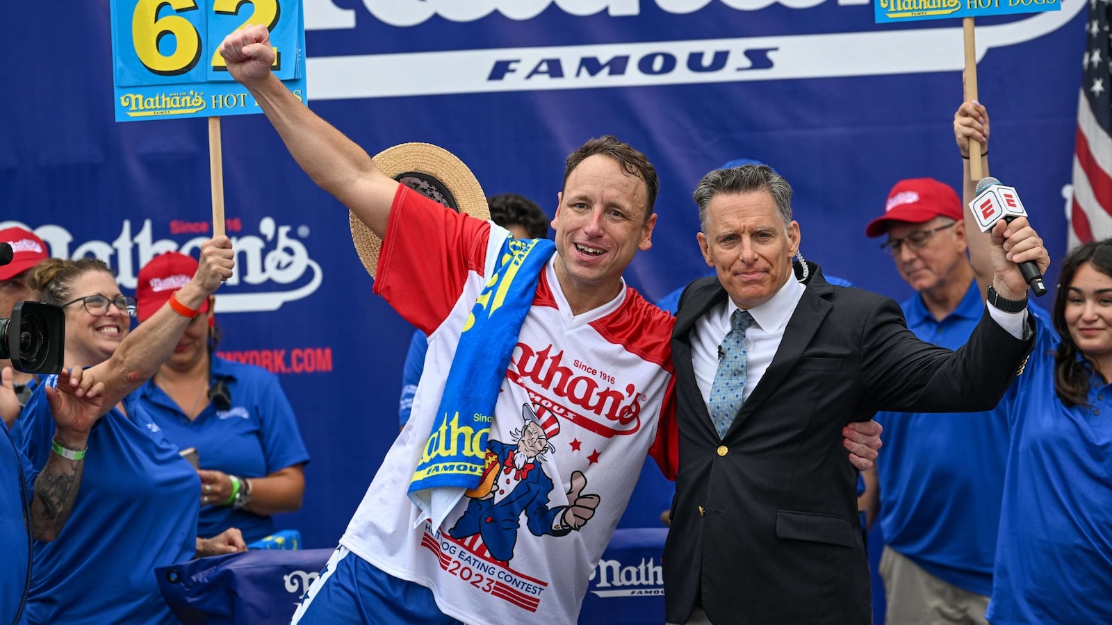 Joey Chestnut wins 16th hot dog eating contest after storm delays event ...