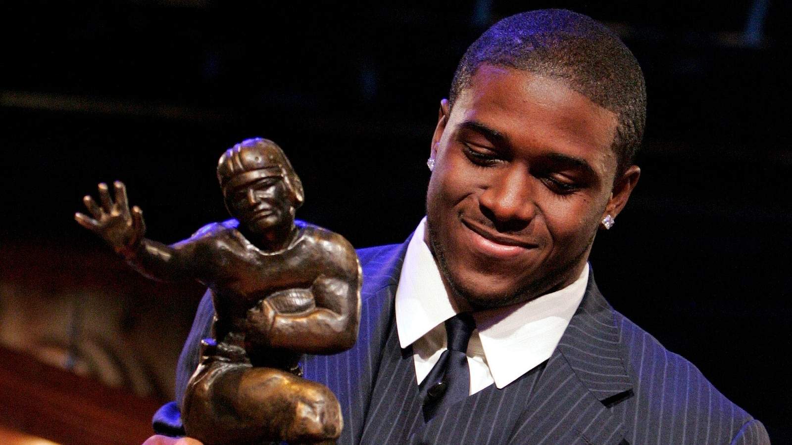 Former college and NFL star Reggie Bush's 2005 Heisman Trophy ...