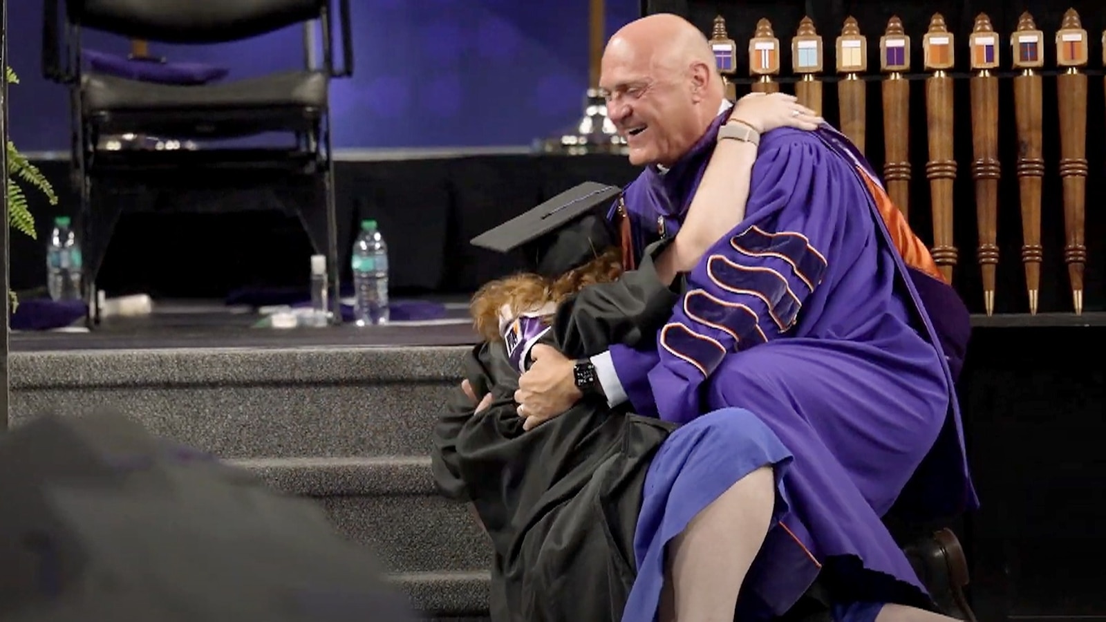 Clemson president gets 'joyful tackle' from graduating daughter - ABC News