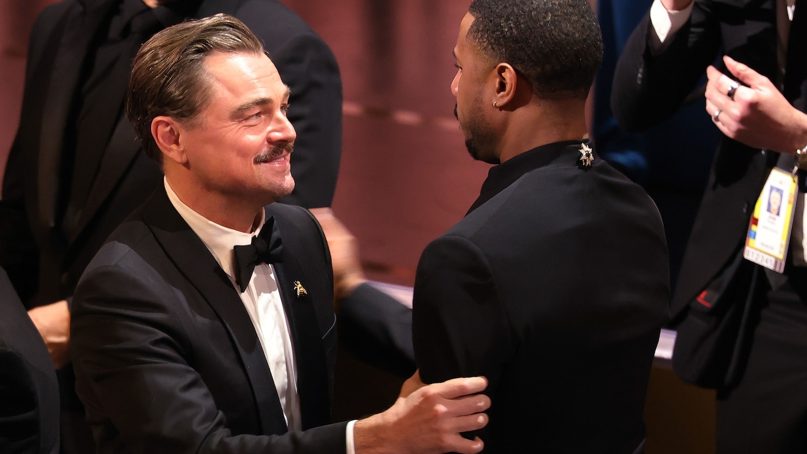 Michael B. Jordan and Leonardo DiCaprio embrace after Jordan's Oscar ...