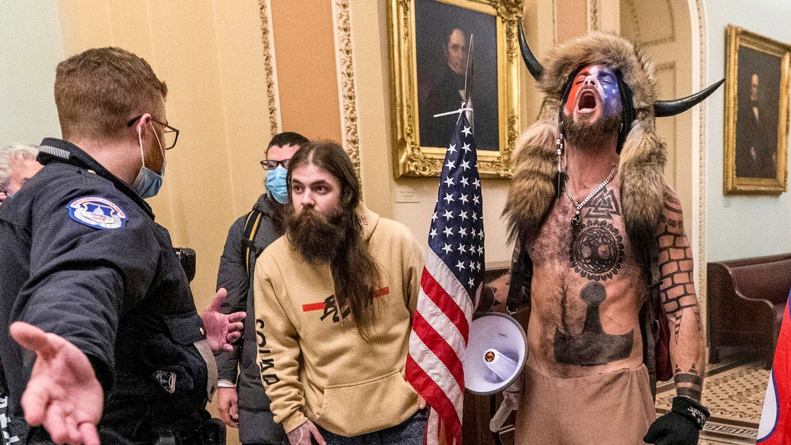 DOJ says video of 'QAnon Shaman' Fox aired lacks context - ABC News