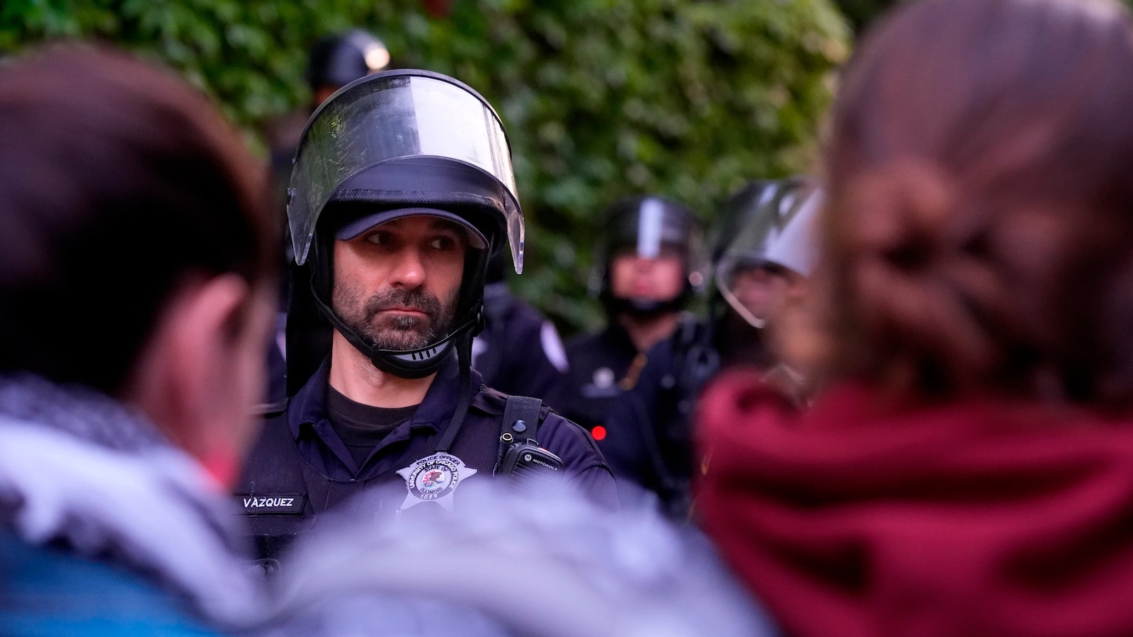 College protests updates: Police begin dismantling University of ...