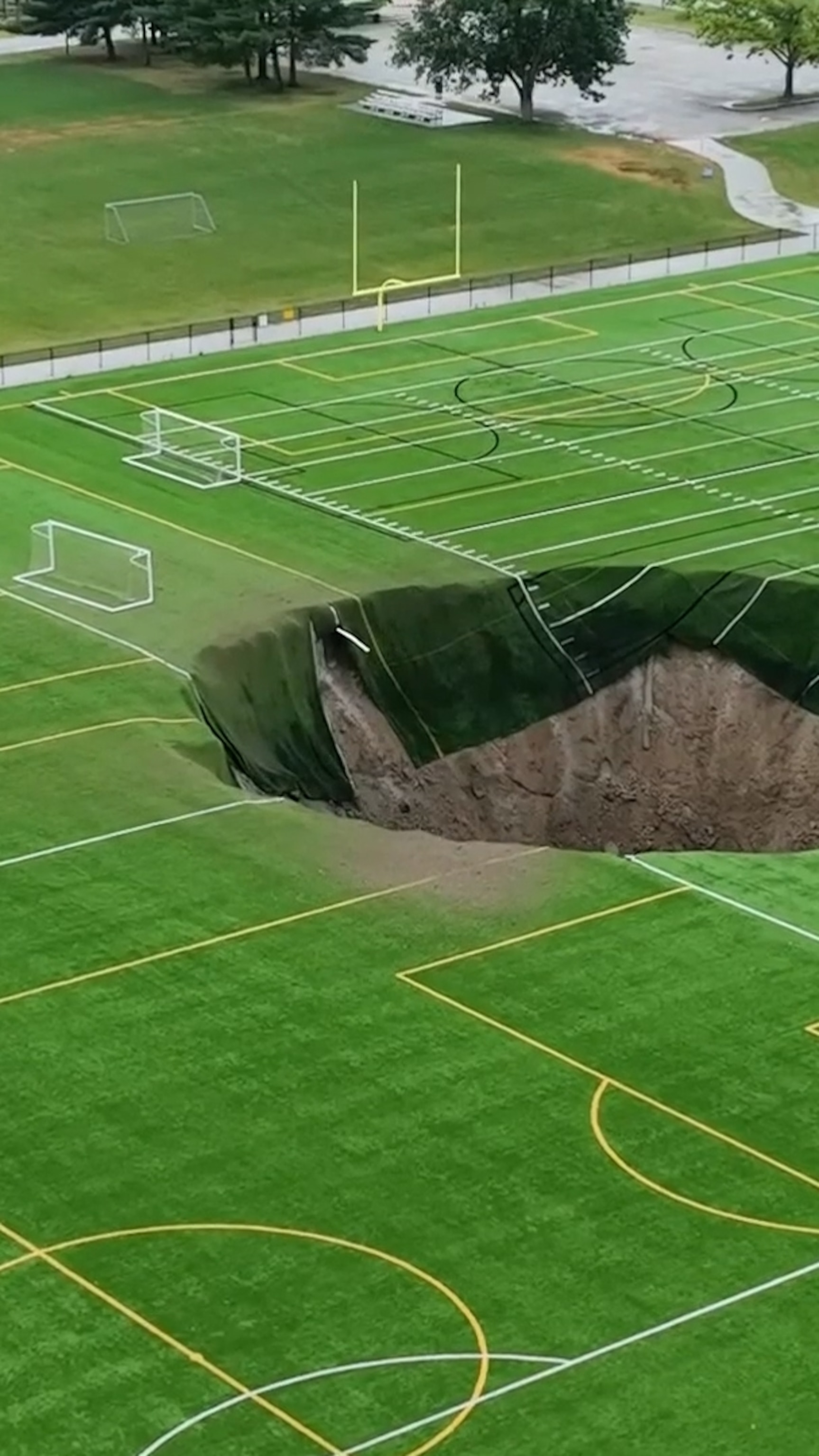 Giant Sinkhole Appears In Illinois Soccer Field Following Mine Collapse