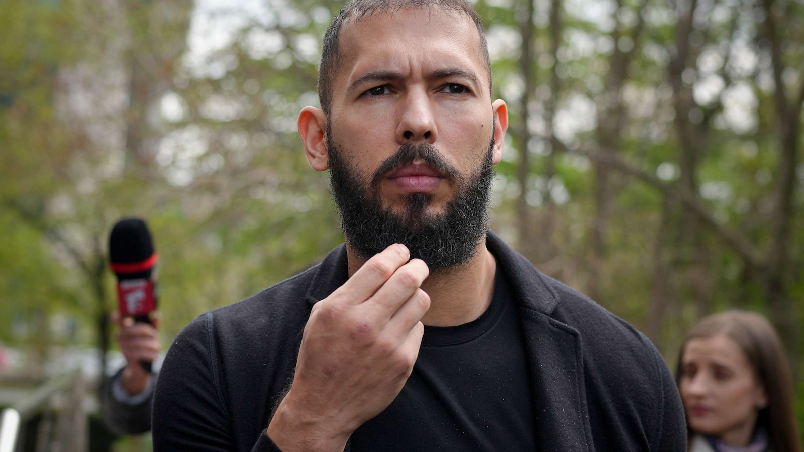 Andrew Tate charged with rape, human trafficking, Romanian officials ...