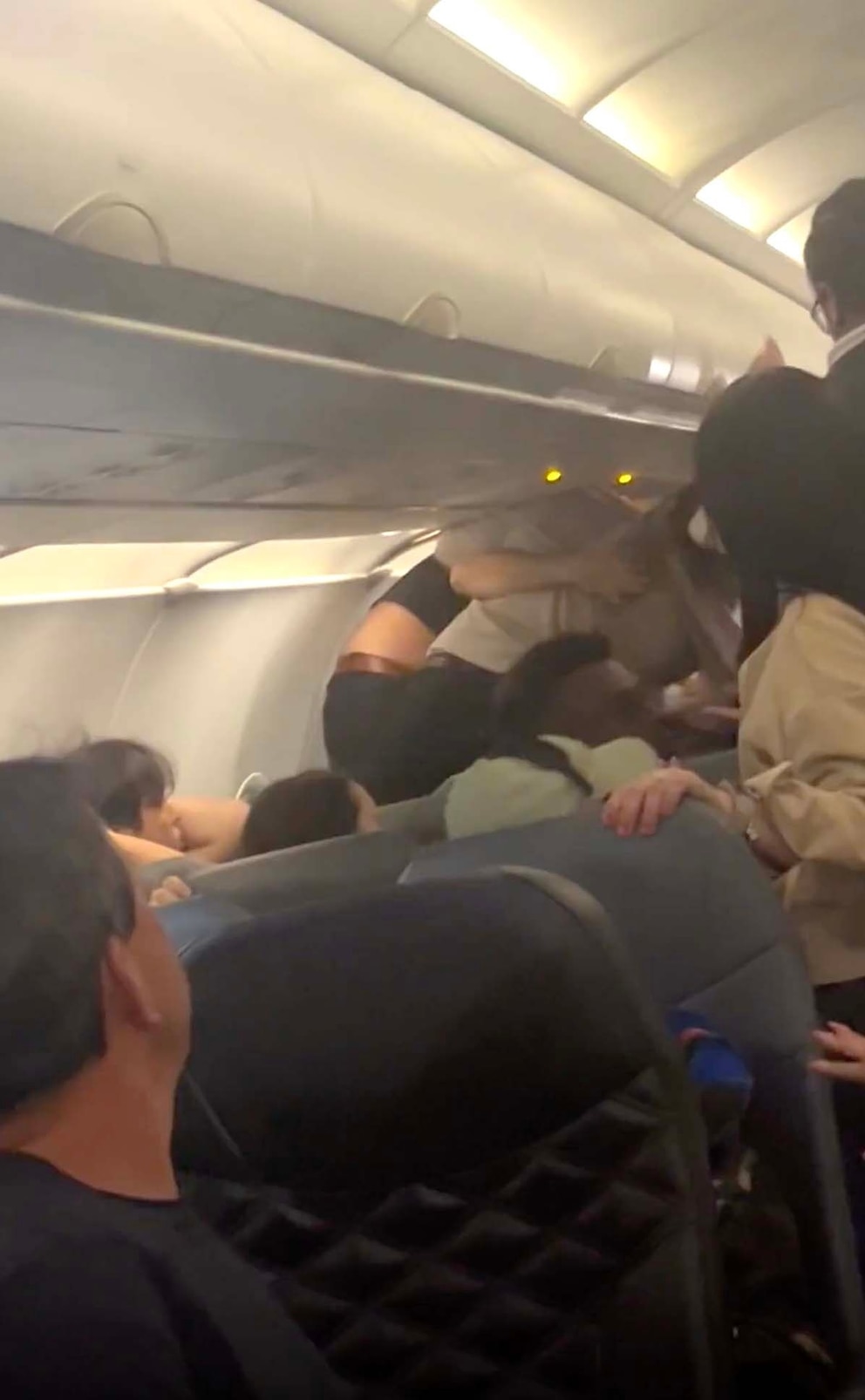 Man arrested for allegedly attacking fellow passenger 'unprovoked' on ...