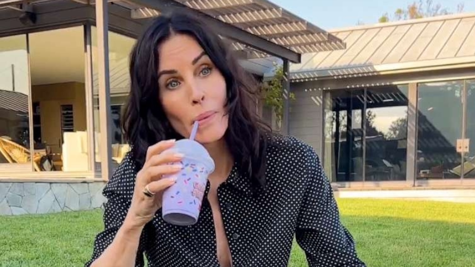 Courteney Cox and her dog may win the weird, viral Grimace Birthday Shake trend - ABC News