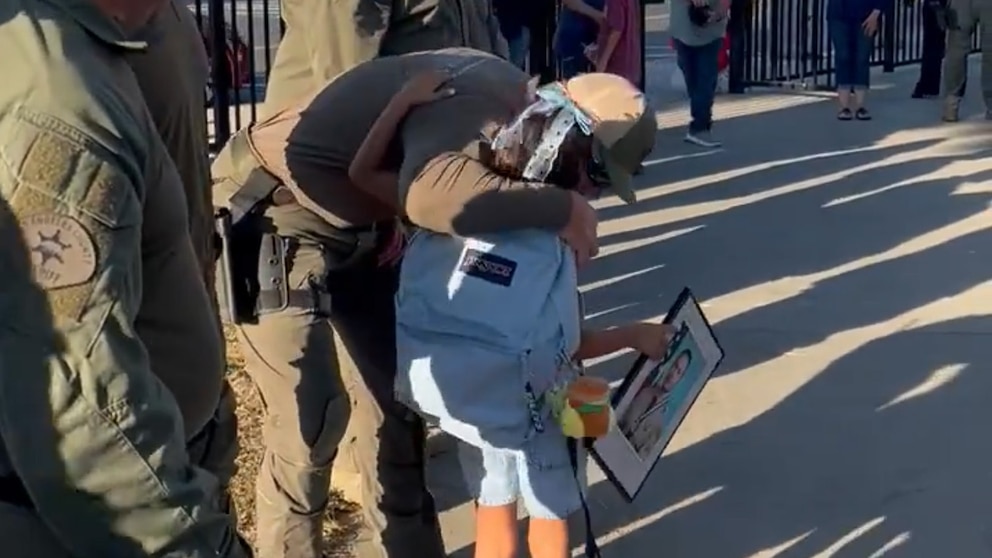 Sheriff's deputies escort late colleague's daughter on 1st day of ...