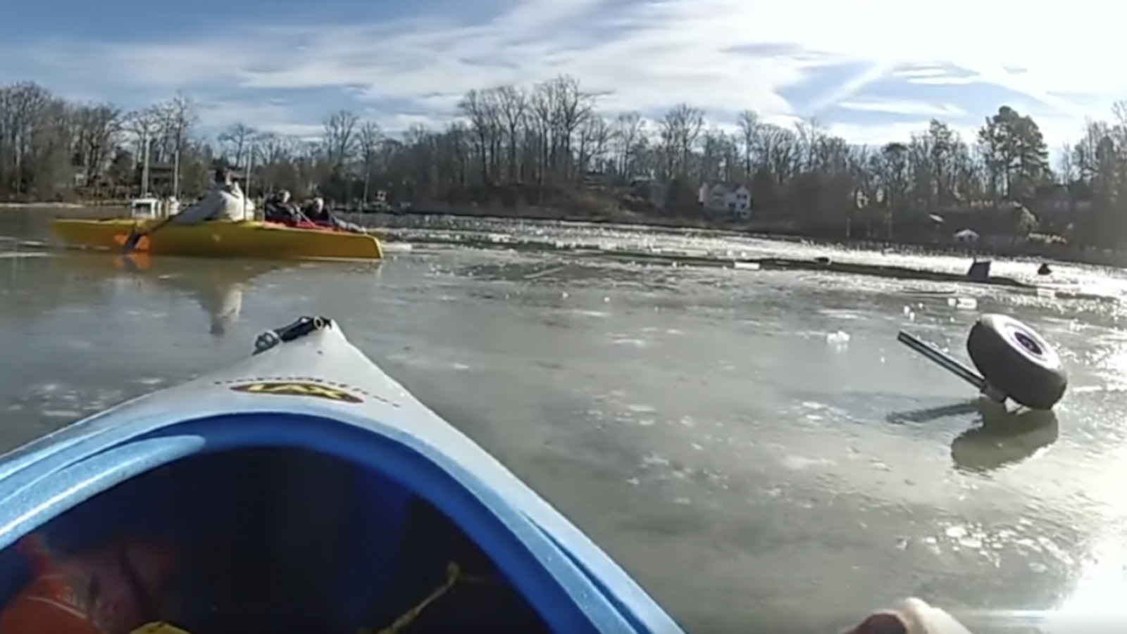 Father-and-son kayakers rescue pilot who crash-landed in icy creek ...