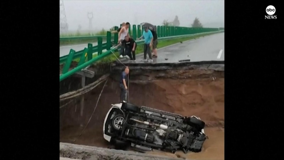 Video Car drives off collapsed bridge into crater - ABC News