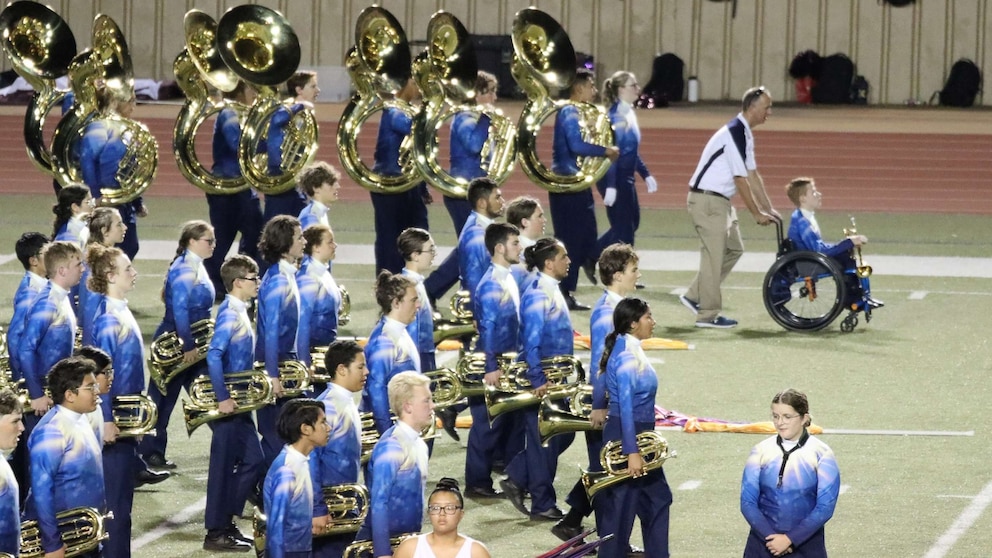 High school band director helps student fulfill marching band dream ...