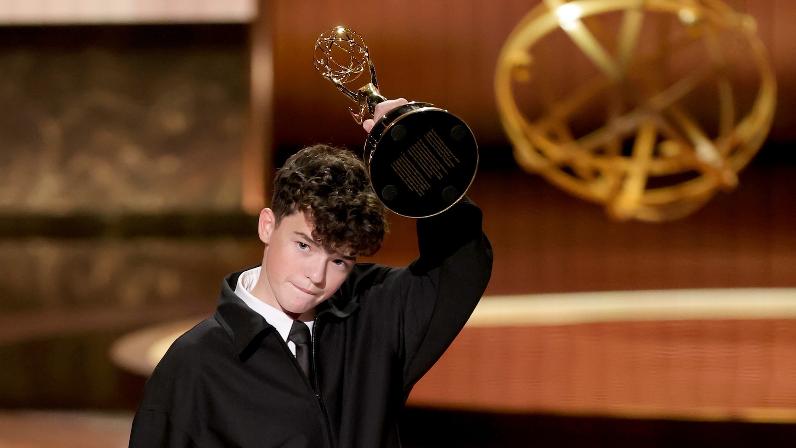'Adolescence' star Owen Cooper becomes category's youngest Emmy winner ...