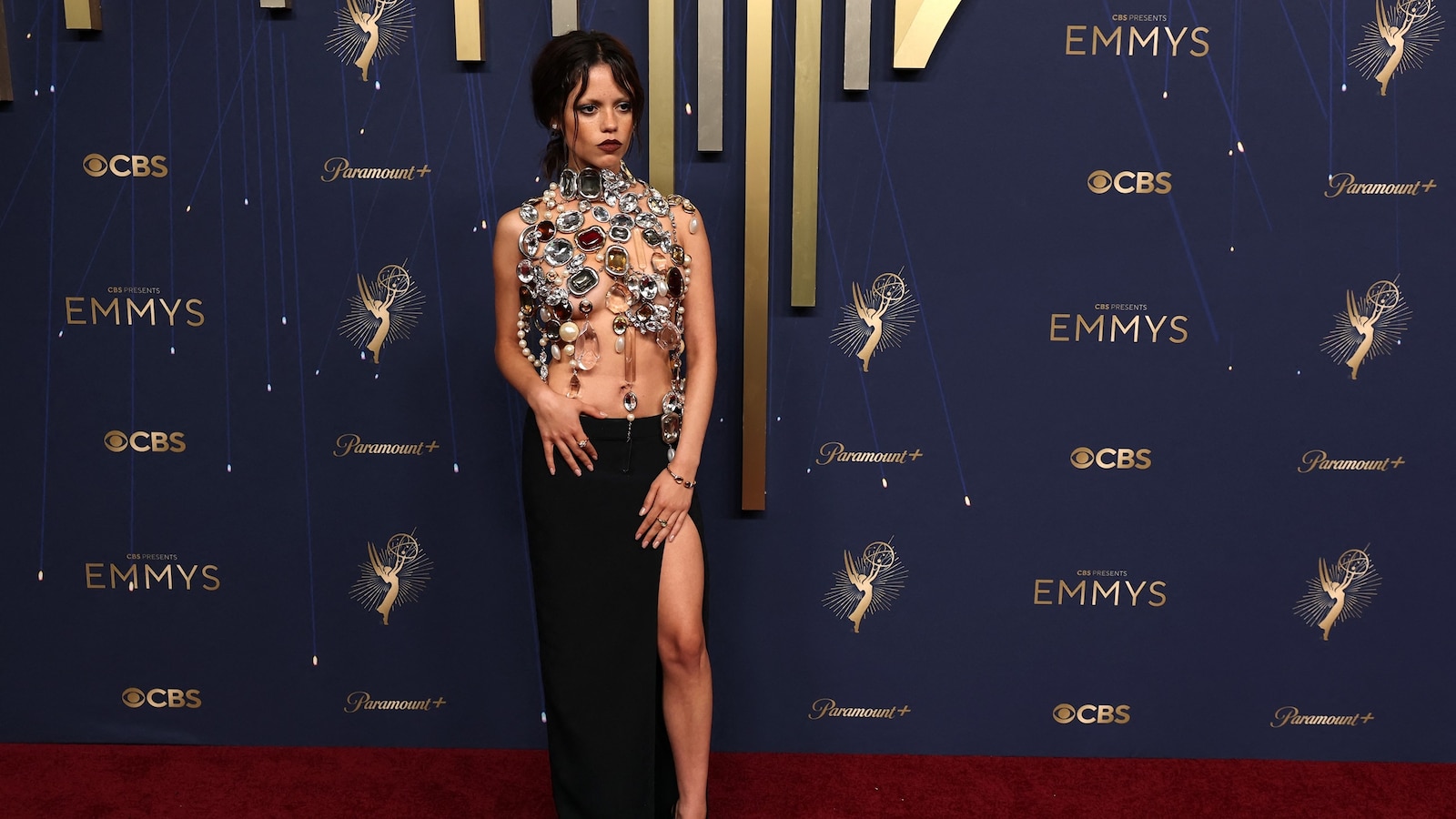 Jenna Ortega dazzles in multicolored gem ensemble at 2025 Emmys - ABC News