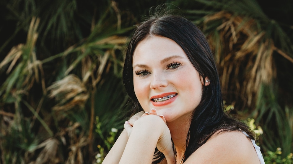 Step-sibling of cheerleader found dead on Carnival cruise may face charges: Filing - ABC News