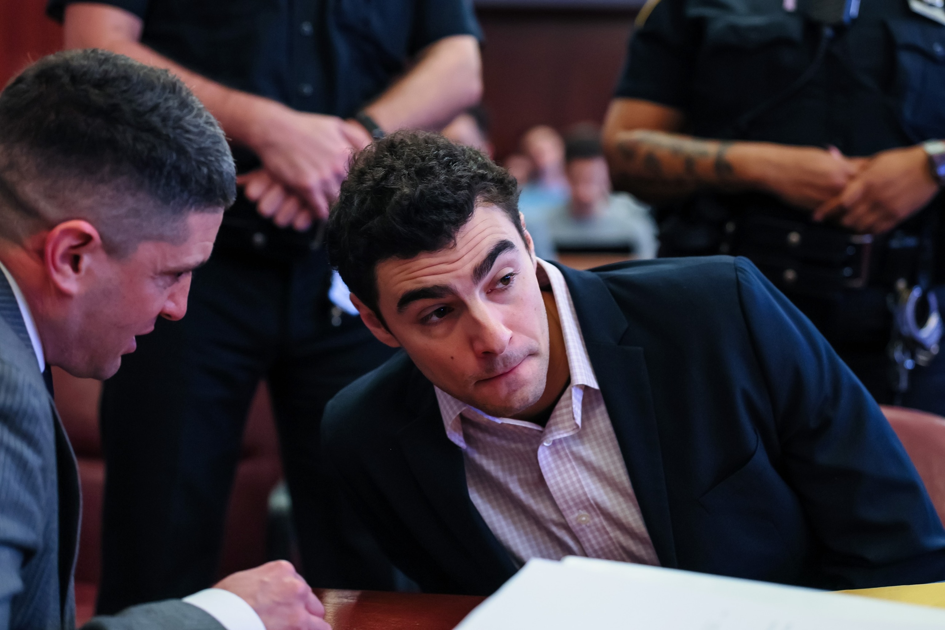 'I knew it was him immediately,' officer who found Luigi Mangione ...