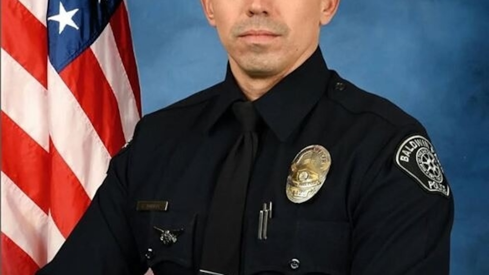 Suspect charged with murder in shooting that killed 2, including ...