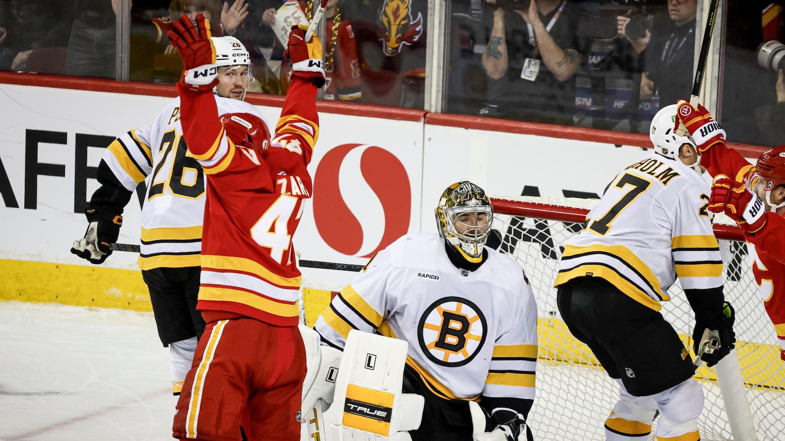 Connor Zary scores on OT power play to lift the Flames past the Bruins ...