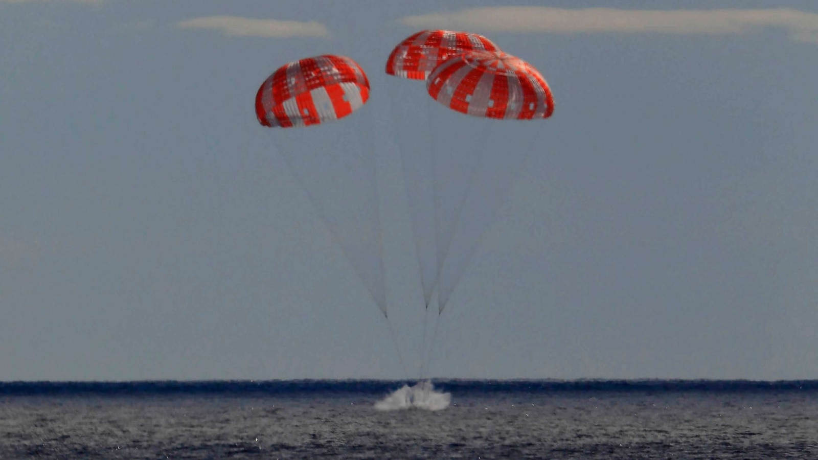 Artemis I Orion capsule splashes down after NASA mission near moon ...