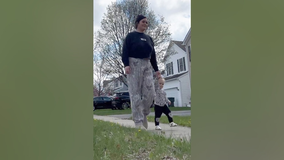 Woman paralyzed after fall learns to walk again alongside 1-year-old ...