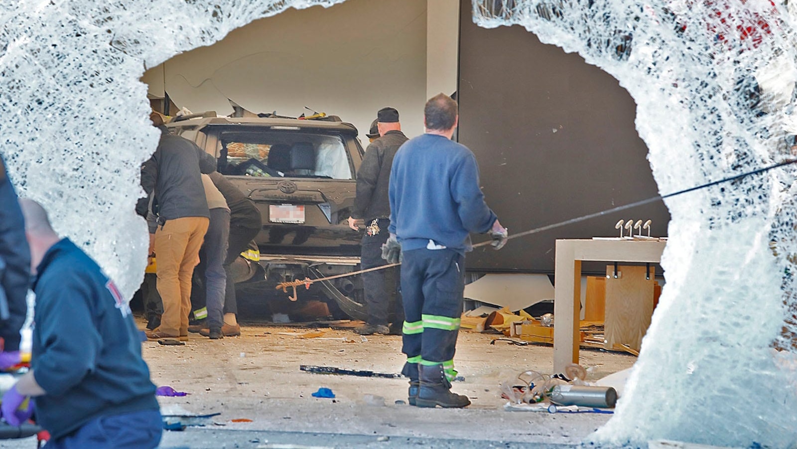 Driver charged in deadly Apple store crash said his foot got stuck on ...