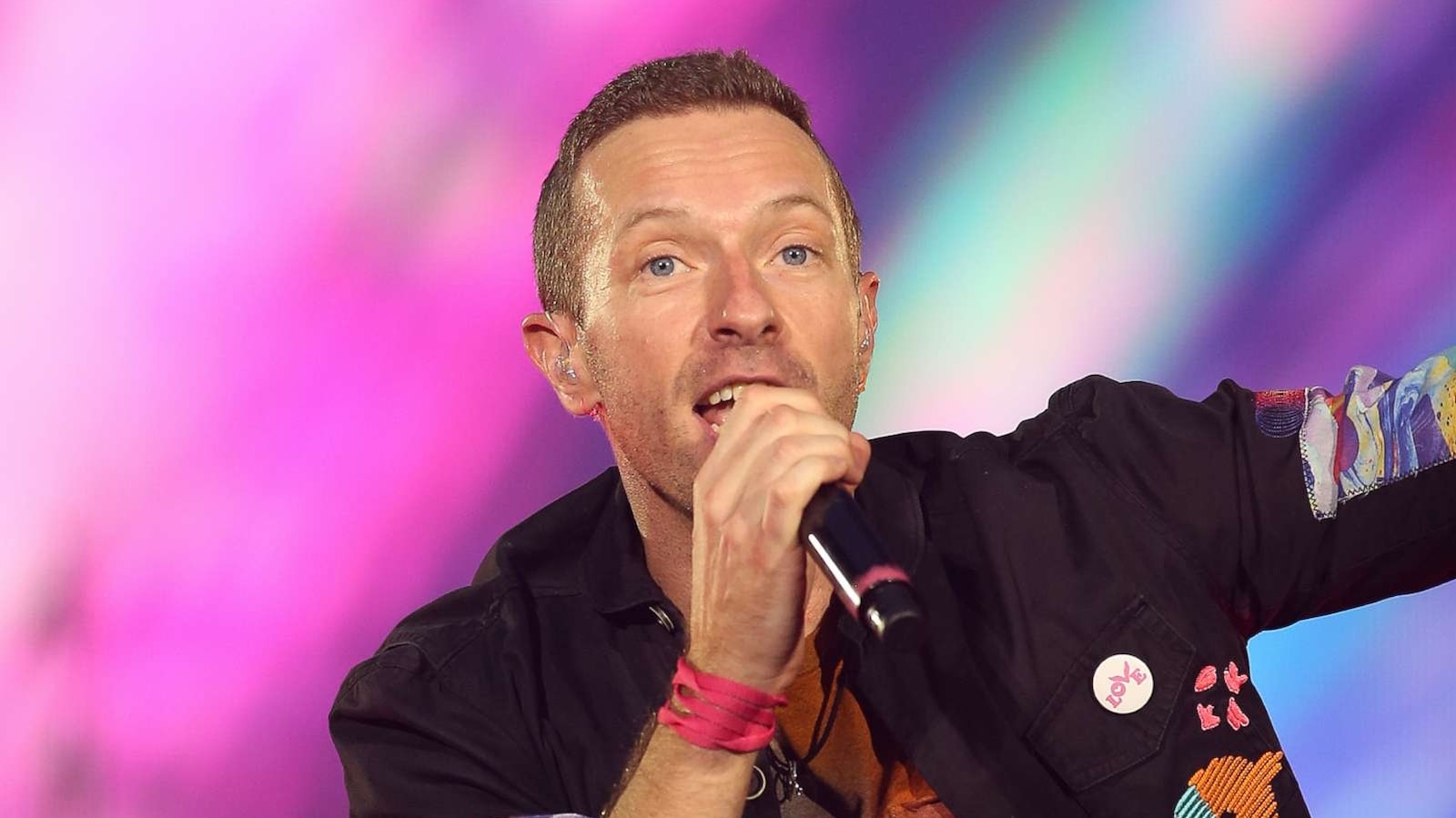 Chris Martin battling 'serious lung infection,' Coldplay forced to ...