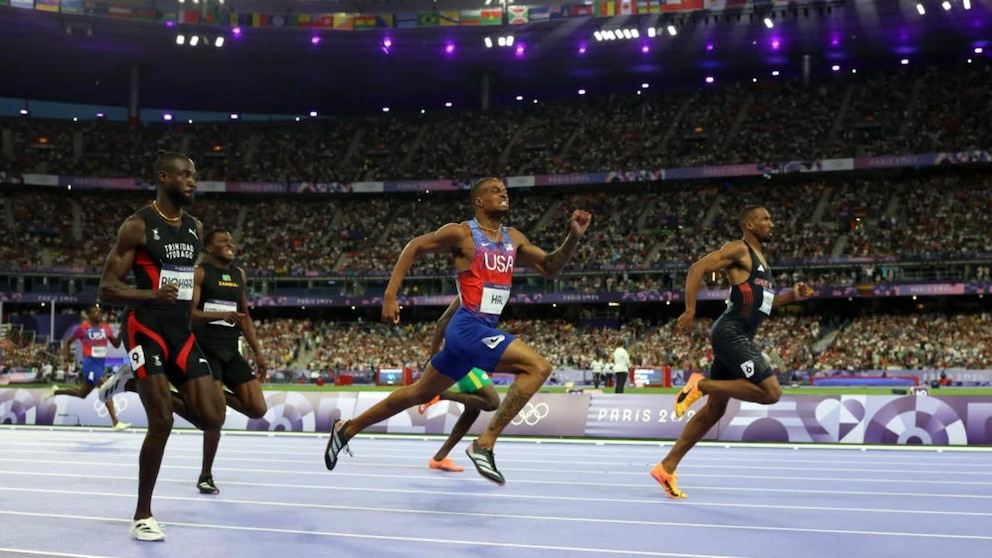 Video American Quincy Hall stuns Olympics with incredible comeback ...