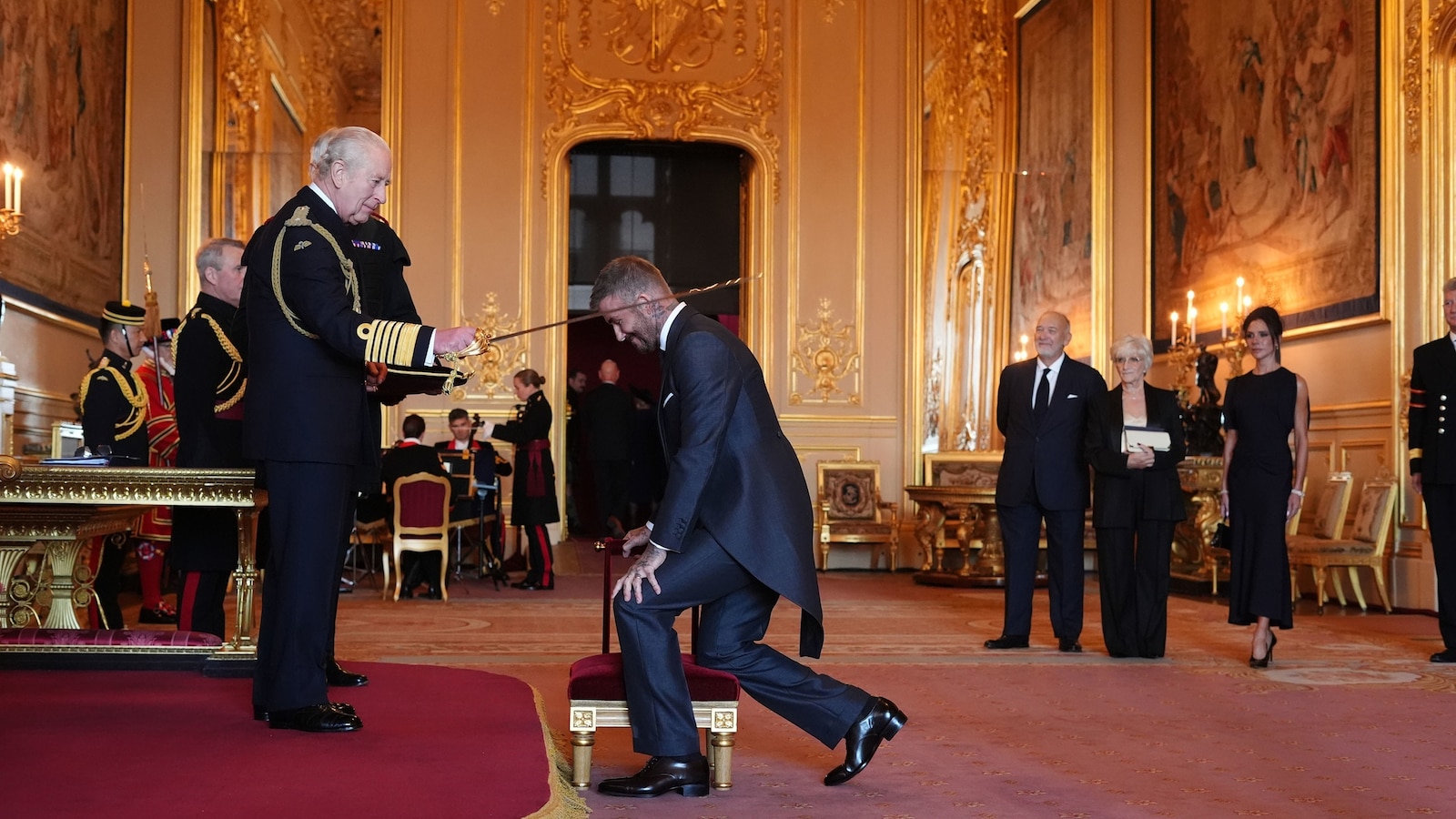 David Beckham knighted by King Charles III at Windsor Castle - ABC News