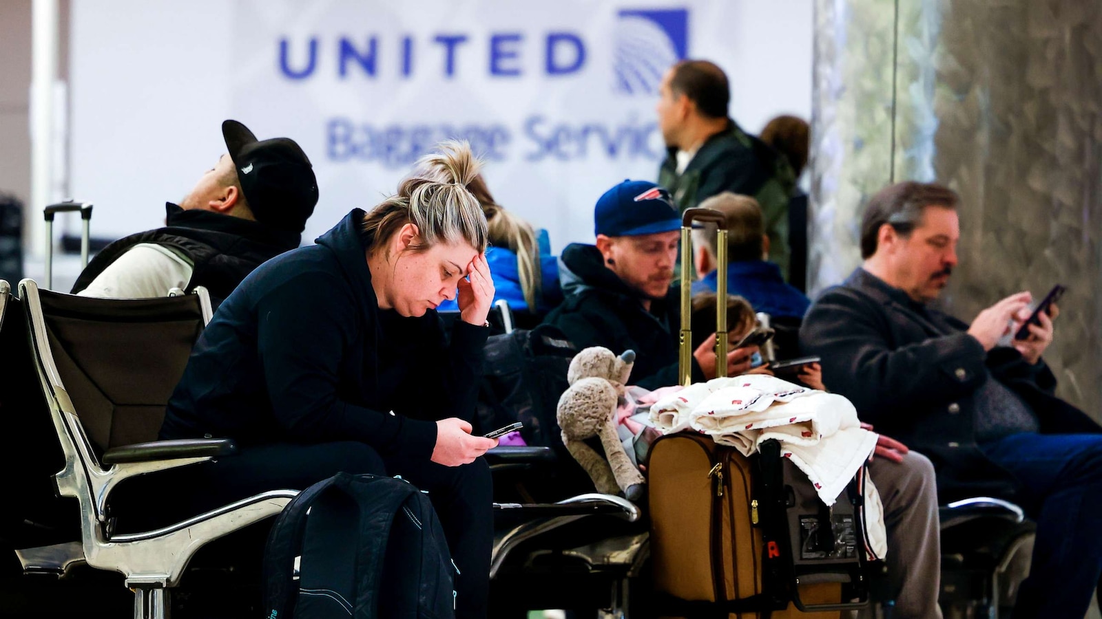 More than 2,500 flights canceled as winter storms slam large part of ...