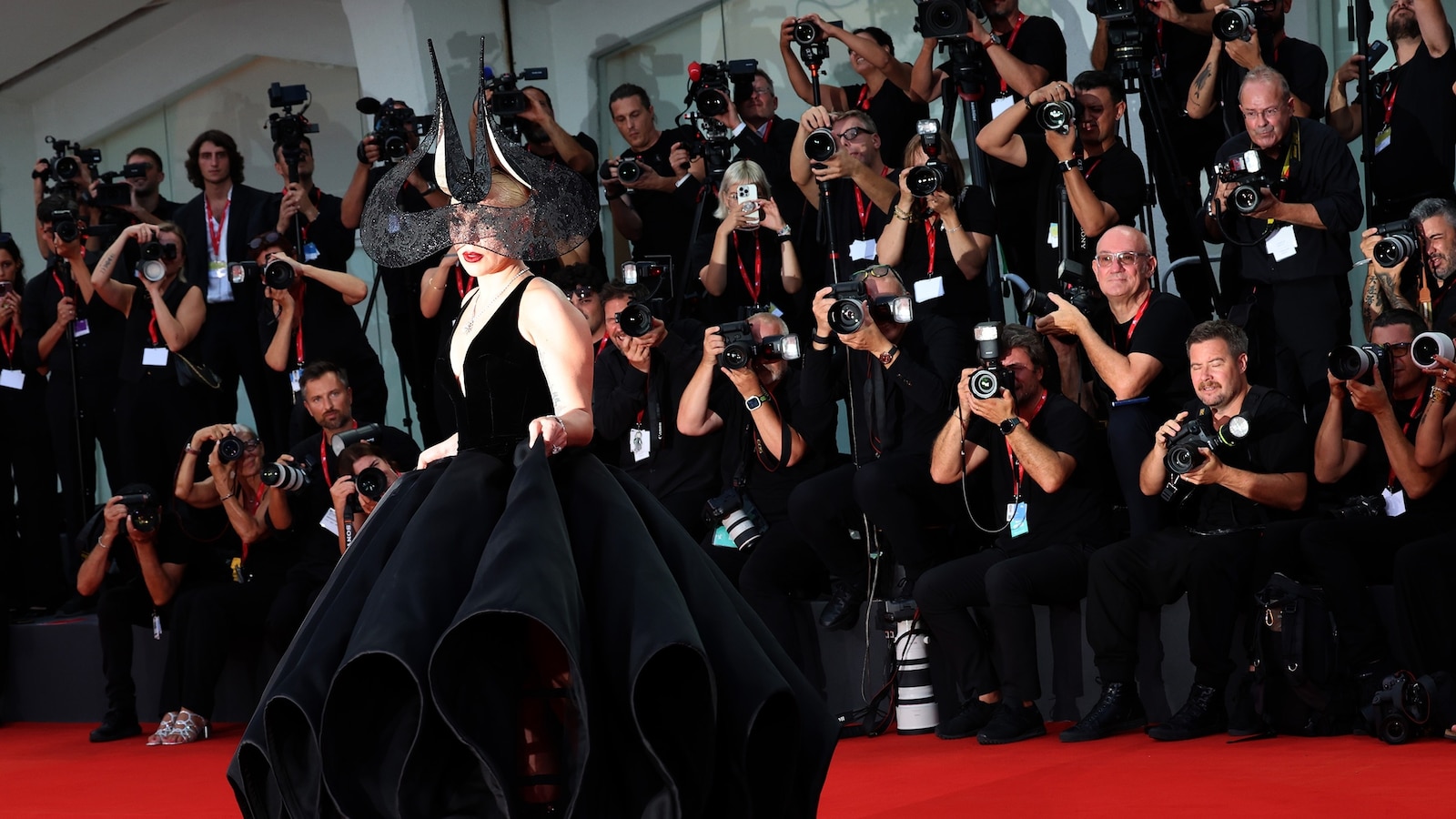 Lady Gaga steps out in dramatic headpiece for 'Joker: Folie À Deux ...