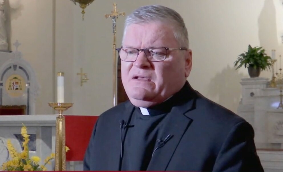 Security camera captures man attacking priest during church service ...