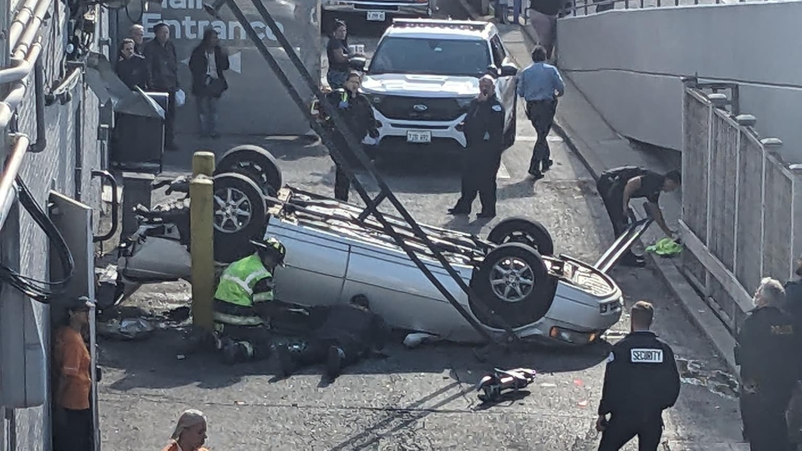 Driver hurt after car plummets from edge of mall parking lot to the ...