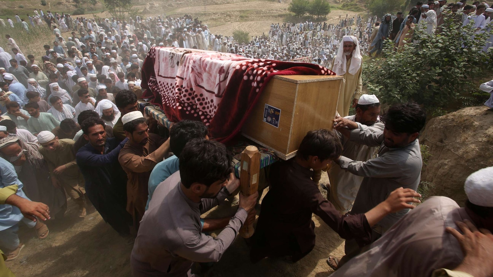 Death toll rises to 54 after blast at Pakistan political gathering ...