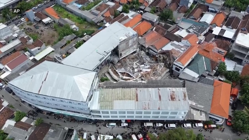 Video Dozens of students trapped after school collapses in Indonesia ...