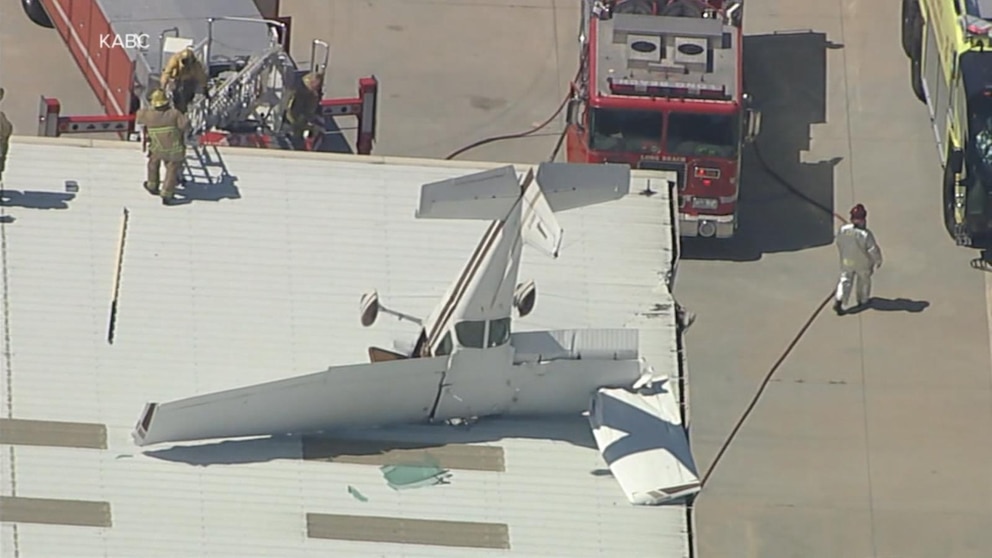 Video Small plane crashes into roof of building: Officials - ABC News